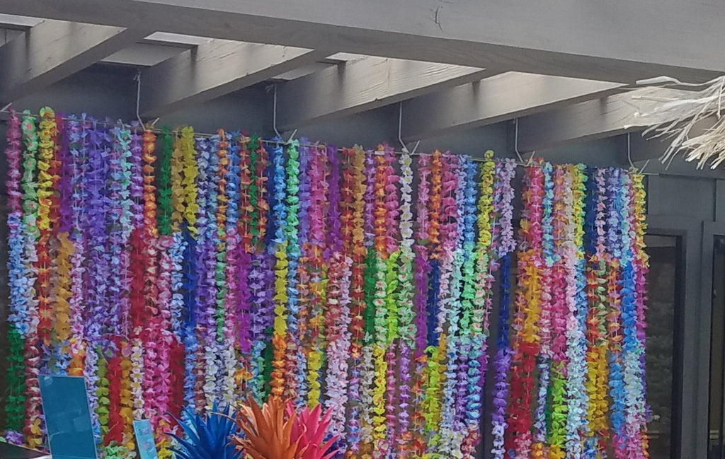Hawaiian Floral silk lei wall – Events By Design, Event Rentals of Oregon